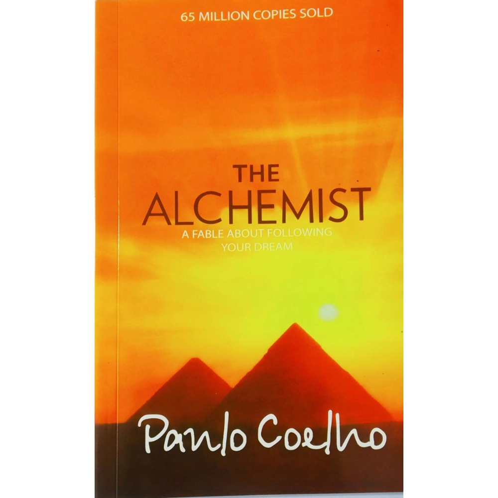 The Alchemist by Paulo Coelho (Paperback edition),White print